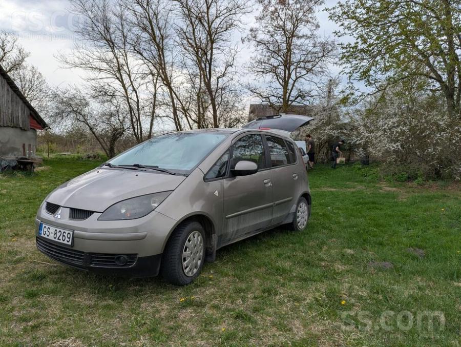 Grey Mitsubishi Colt 2007 in Riga, with an engine capacity of 1.30 L and mileage of 239 thousand km for 170 €, photo 5 on AUTOMOTO.COM.LV