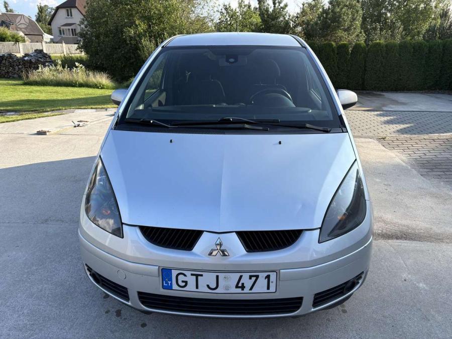 Grey Mitsubishi Colt 2007 in Plunge, with an engine capacity of 1.49 L and mileage of 277 thousand km for 990 €, photo 4 on AUTOMOTO.COM.LV