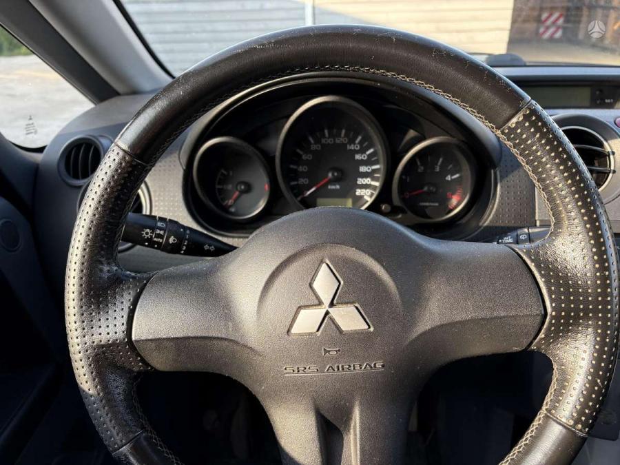 Grey Mitsubishi Colt 2007 in Plunge, with an engine capacity of 1.49 L and mileage of 277 thousand km for 990 €, photo 10 on AUTOMOTO.COM.LV