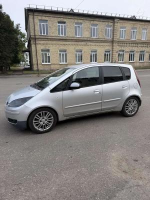 Grey Mitsubishi Colt 2007 in Vilnius, with an engine capacity of 1.49 L and mileage of 218 thousand km for 550 €, photo 3 on AUTOMOTO.COM.LV