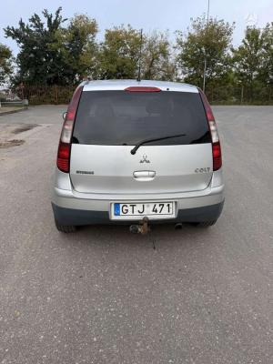 Grey Mitsubishi Colt 2007 in Vilnius, with an engine capacity of 1.49 L and mileage of 218 thousand km for 550 €, photo 5 on AUTOMOTO.COM.LV