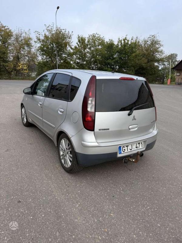 Grey Mitsubishi Colt 2007 in Vilnius, with an engine capacity of 1.49 L and mileage of 218 thousand km for 550 €, photo 4 on AUTOMOTO.COM.LV