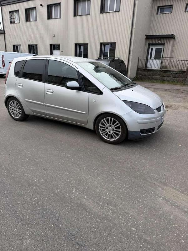 Grey Mitsubishi Colt 2007 in Vilnius, with an engine capacity of 1.49 L and mileage of 218 thousand km for 550 €, photo 7 on AUTOMOTO.COM.LV