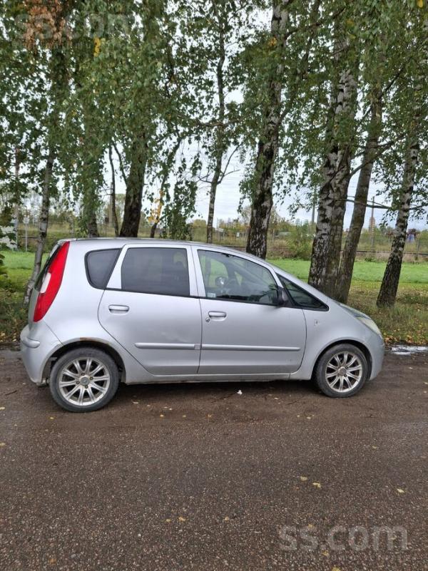 Pelēks Mitsubishi Colt 2007 Rīga, ar dzinēja tilpumu 1.50 L un nobraukumu 200 tūkst. km par 500 €, foto 3 vietnē AUTOMOTO.COM.LV