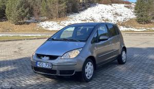 Pelēks Mitsubishi Colt 2008 Viļņa, ar dzinēja tilpumu 1.30 L un nobraukumu 155 tūkst. km par 950 €, foto  vietnē AUTOMOTO.COM.LV