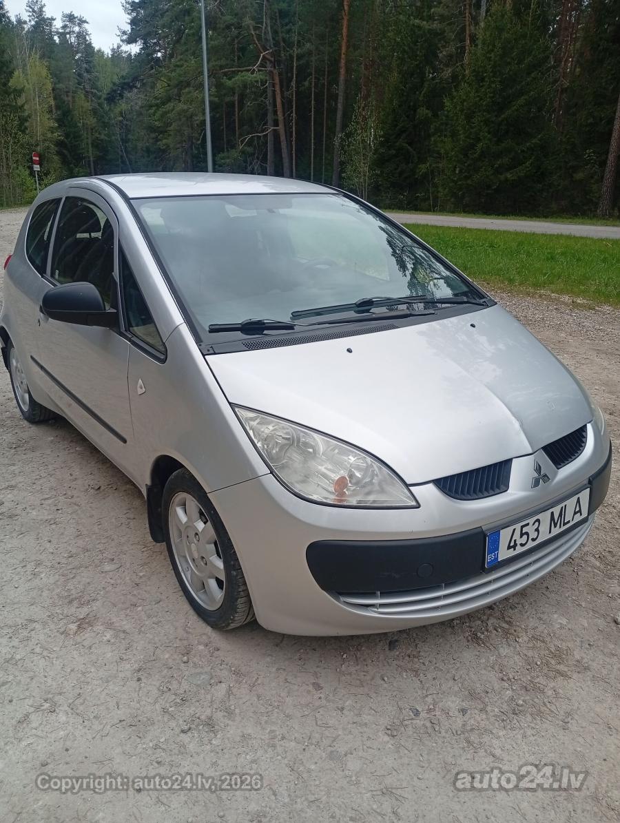 Pelēks Mitsubishi Colt 2008 Veru, ar dzinēja tilpumu 1.10 L un nobraukumu 244 tūkst. km par 1900 €, foto 1 vietnē AUTOMOTO.COM.LV