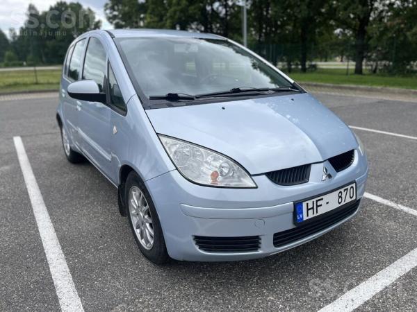 Grey Mitsubishi Colt 2008 in Valmiera, with an engine capacity of 1.30 L and mileage of 243 thousand km for 1550 €, photo 7 on AUTOMOTO.COM.LV