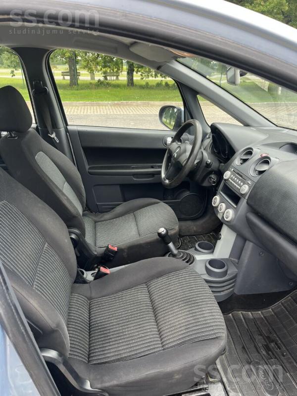 Grey Mitsubishi Colt 2008 in Valmiera, with an engine capacity of 1.30 L and mileage of 243 thousand km for 1550 €, photo 10 on AUTOMOTO.COM.LV