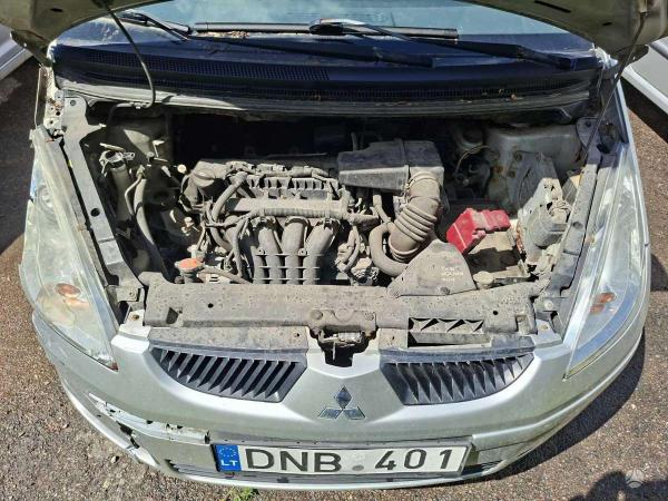 Grey Mitsubishi Colt 2008 in Vilnius, with an engine capacity of 1.33 L and mileage of 180 thousand km for 350 €, photo 6 on AUTOMOTO.COM.LV
