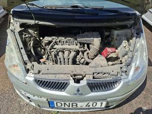 Pelēks Mitsubishi Colt 2008 Viļņa, ar dzinēja tilpumu 1.33 L un nobraukumu 180 tūkst. km par 350 €, foto 7 vietnē AUTOMOTO.COM.LV
