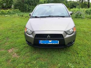 Pelēks Mitsubishi Colt 2010 Širvintos, ar dzinēja tilpumu 1.33 L un nobraukumu 180 tūkst. km par 1600 €, foto 6 vietnē AUTOMOTO.COM.LV