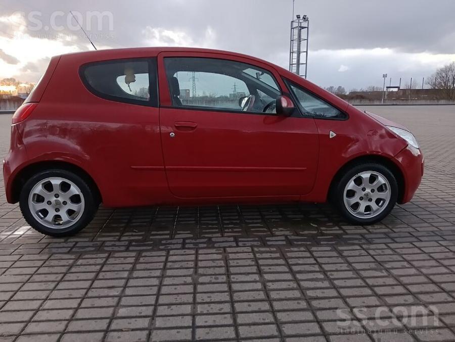 Red Mitsubishi Colt 2006 in Riga, with an engine capacity of 1.30 L and mileage of 214 thousand km for 1800 €, photo 1 on AUTOMOTO.COM.LV