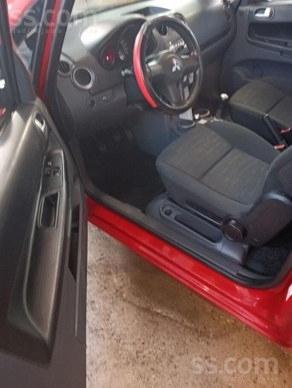Red Mitsubishi Colt 2006 in Riga, with an engine capacity of 1.30 L and mileage of 215 thousand km for 2400 €, photo 7 on AUTOMOTO.COM.LV