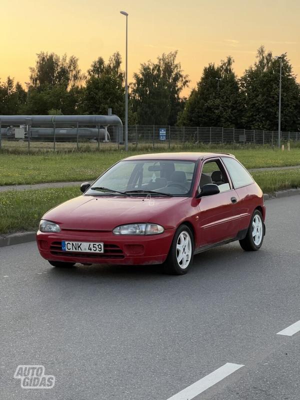 Red Mitsubishi Colt 1996 in Vilnius, with an engine capacity of 1.60 L and mileage of 287 thousand km for 1350 €, photo 1 on AUTOMOTO.COM.LV