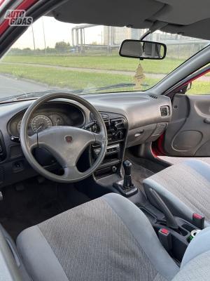 Sarkans Mitsubishi Colt 1996 Viļņa, ar dzinēja tilpumu 1.60 L un nobraukumu 287 tūkst. km par 1350 €, foto 6 vietnē AUTOMOTO.COM.LV