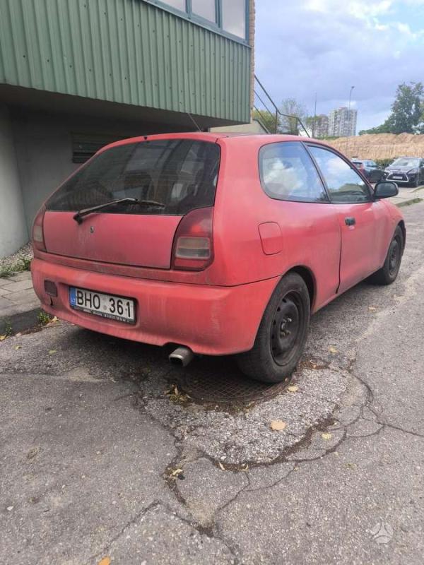 Red Mitsubishi Colt 1997 in Vilnius, with an engine capacity of 1.30 L and mileage of 239 thousand km for 650 €, photo 3 on AUTOMOTO.COM.LV