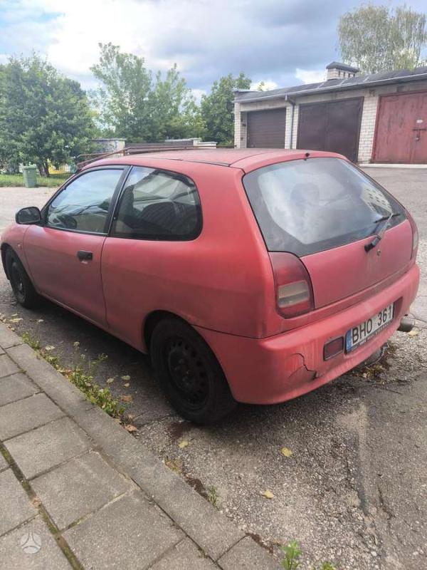 Red Mitsubishi Colt 1997 in Vilnius, with an engine capacity of 1.30 L and mileage of 239 thousand km for 650 €, photo 4 on AUTOMOTO.COM.LV