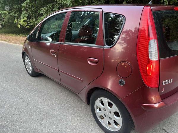 Sarkans Mitsubishi Colt 2005 Anykščiai, ar dzinēja tilpumu 1.33 L un nobraukumu 192 tūkst. km par 500 €, foto 7 vietnē AUTOMOTO.COM.LV