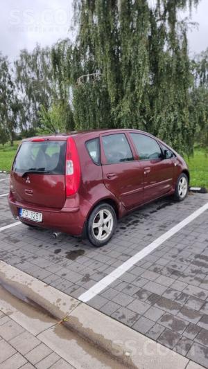 Red Mitsubishi Colt 2005 in Riga, with an engine capacity of 1.50 L and mileage of 278 thousand km for 1200 €, photo 4 on AUTOMOTO.COM.LV