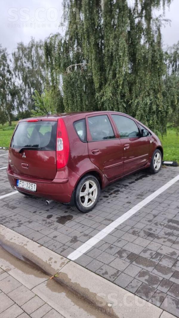 Red Mitsubishi Colt 2005 in Riga, with an engine capacity of 1.50 L and mileage of 278 thousand km for 1200 €, photo 4 on AUTOMOTO.COM.LV