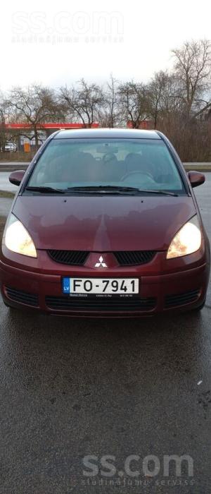 Sarkans Mitsubishi Colt 2005 Rīga, ar dzinēja tilpumu 1.50 L un nobraukumu 176 tūkst. km par 1990 €, foto  vietnē AUTOMOTO.COM.LV