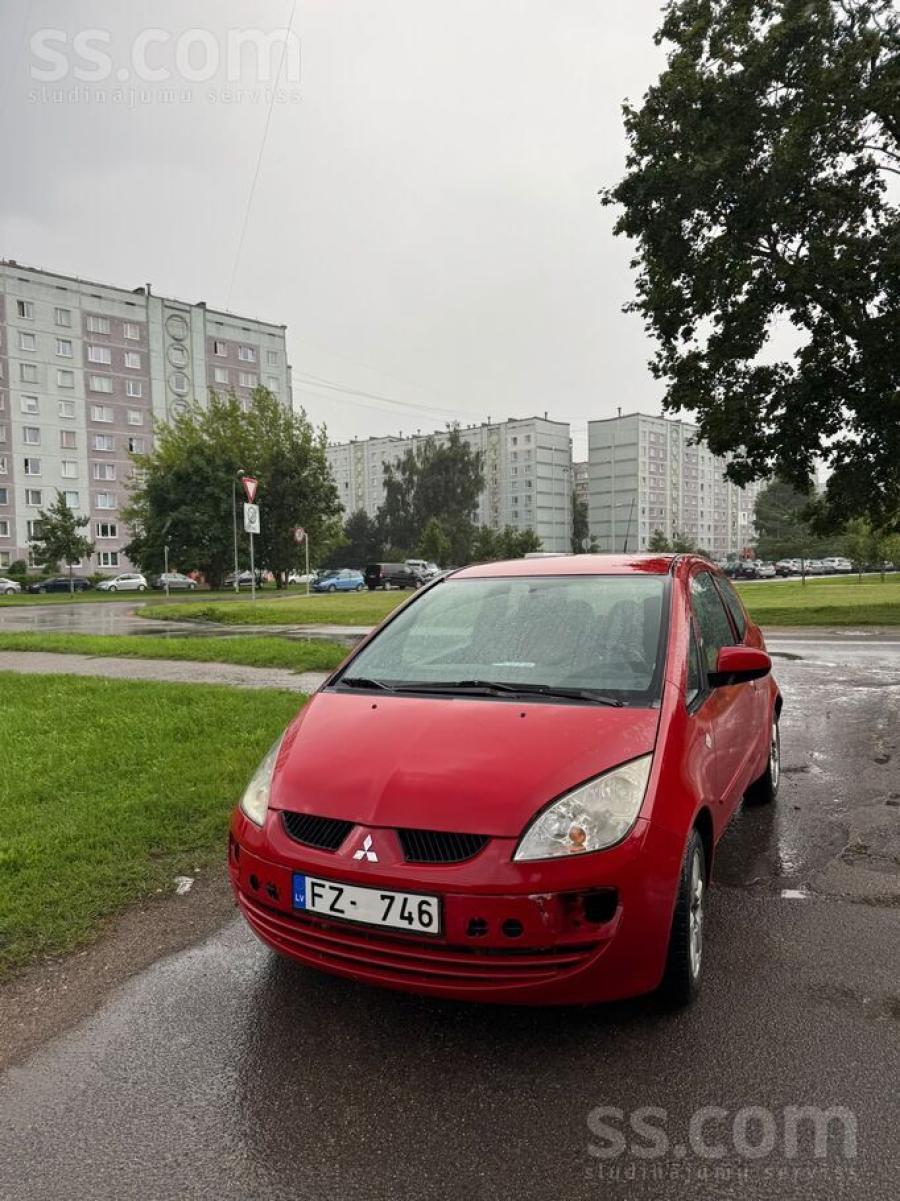 Red Mitsubishi Colt 2006 in Riga, with an engine capacity of 1.50 L and mileage of 172 thousand km for 550 €, photo 1 on AUTOMOTO.COM.LV