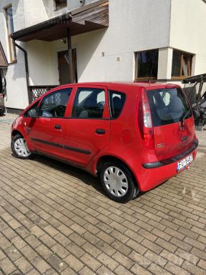 Sarkans Mitsubishi Colt 2006 Rīga, ar dzinēja tilpumu 1.30 L un nobraukumu 238 tūkst. km par 1000 €, foto 4 vietnē AUTOMOTO.COM.LV