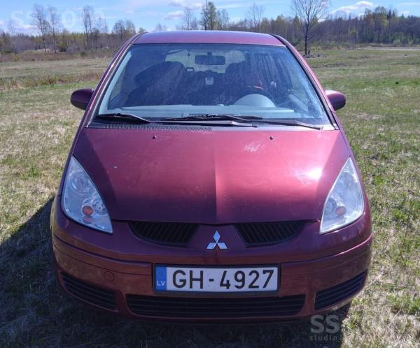 Red Mitsubishi Colt 2007 in Limbazi, with an engine capacity of 1.30 L and mileage of 173 thousand km for 1300 €, photo 2 on AUTOMOTO.COM.LV