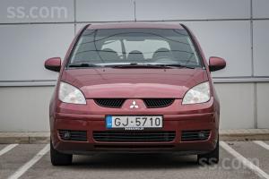 Red Mitsubishi Colt 2007 in Riga, with an engine capacity of 1.30 L and mileage of 343 thousand km for 1490 €, photo 3 on AUTOMOTO.COM.LV