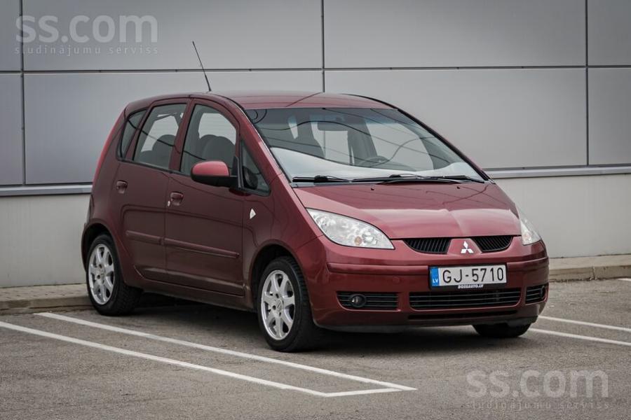 Red Mitsubishi Colt 2007 in Riga, with an engine capacity of 1.30 L and mileage of 343 thousand km for 1490 €, photo 4 on AUTOMOTO.COM.LV