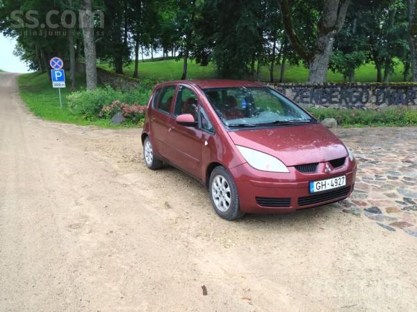 Red Mitsubishi Colt 2007 in Riga, with an engine capacity of 1.30 L and mileage of 179 thousand km for 850 €, photo 1 on AUTOMOTO.COM.LV