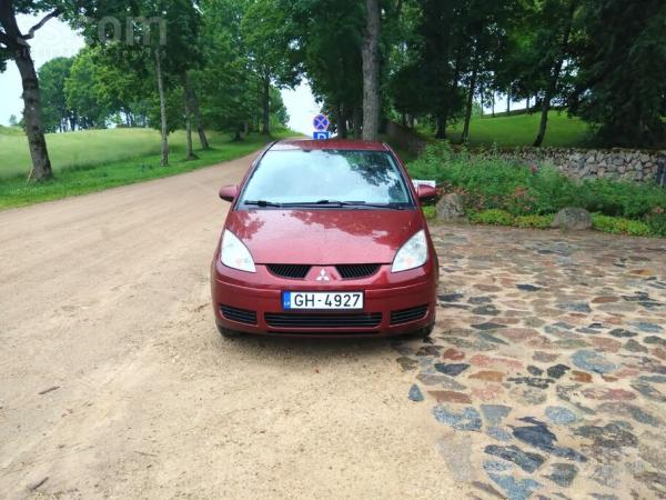 Red Mitsubishi Colt 2007 in Riga, with an engine capacity of 1.30 L and mileage of 179 thousand km for 850 €, photo 4 on AUTOMOTO.COM.LV