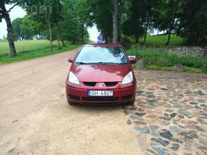 Red Mitsubishi Colt 2007 in Riga, with an engine capacity of 1.30 L and mileage of 179 thousand km for 850 €, photo 4 on AUTOMOTO.COM.LV