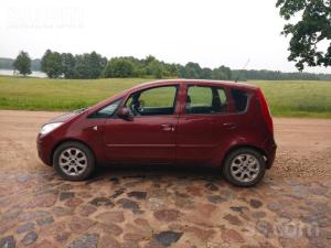 Red Mitsubishi Colt 2007 in Riga, with an engine capacity of 1.30 L and mileage of 179 thousand km for 850 €, photo 5 on AUTOMOTO.COM.LV