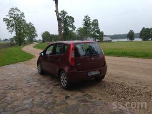Red Mitsubishi Colt 2007 in Riga, with an engine capacity of 1.30 L and mileage of 179 thousand km for 850 €, photo 6 on AUTOMOTO.COM.LV