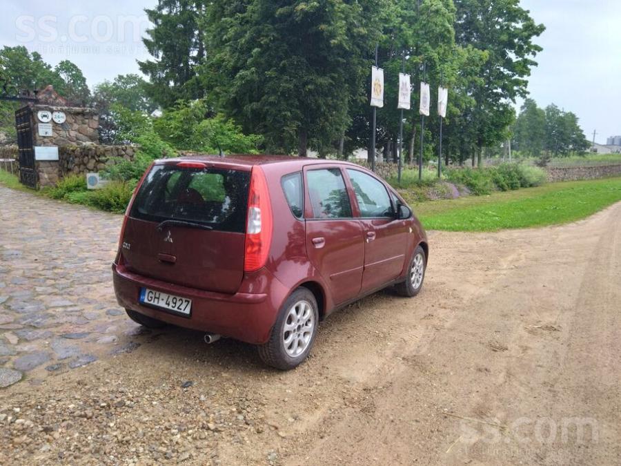 Red Mitsubishi Colt 2007 in Riga, with an engine capacity of 1.30 L and mileage of 179 thousand km for 850 €, photo 8 on AUTOMOTO.COM.LV