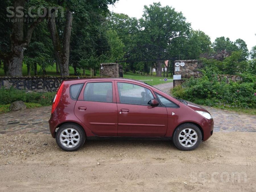 Red Mitsubishi Colt 2007 in Riga, with an engine capacity of 1.30 L and mileage of 179 thousand km for 850 €, photo 9 on AUTOMOTO.COM.LV