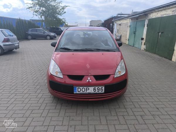 Red Mitsubishi Colt 2008 in Kaunas, with an engine capacity of 1.10 L and mileage of 159 thousand km for 650 €, photo 2 on AUTOMOTO.COM.LV