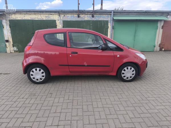 Red Mitsubishi Colt 2008 in Kaunas, with an engine capacity of 1.10 L and mileage of 159 thousand km for 650 €, photo 4 on AUTOMOTO.COM.LV