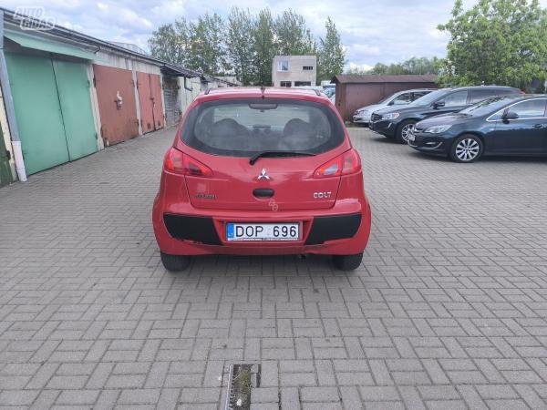 Red Mitsubishi Colt 2008 in Kaunas, with an engine capacity of 1.10 L and mileage of 159 thousand km for 650 €, photo 7 on AUTOMOTO.COM.LV