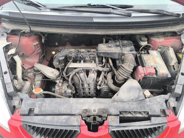 Red Mitsubishi Colt 2008 in Kaunas, with an engine capacity of 1.10 L and mileage of 159 thousand km for 650 €, photo 10 on AUTOMOTO.COM.LV