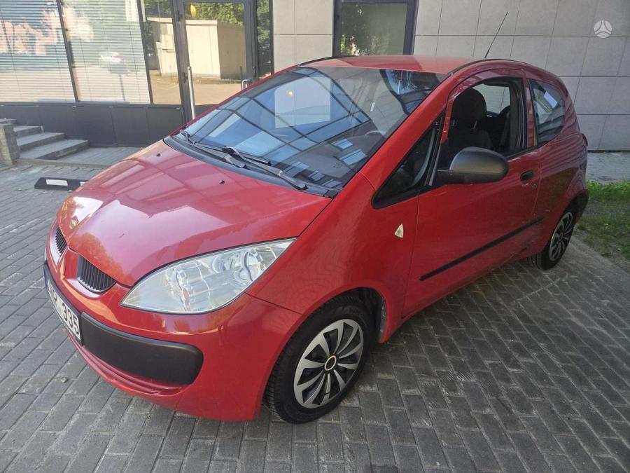 Red Mitsubishi Colt 2008 in Vilnius, with an engine capacity of 1.12 L and mileage of 125 thousand km for 1300 €, photo 1 on AUTOMOTO.COM.LV