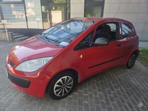 Red Mitsubishi Colt 2008 in Vilnius, with an engine capacity of 1.12 L and mileage of 125 thousand km for 1300 €, photo 3 on AUTOMOTO.COM.LV