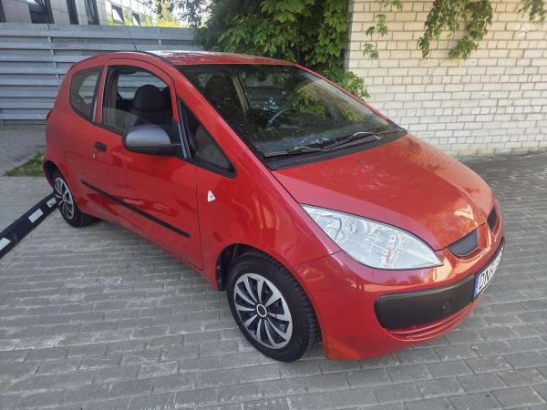 Red Mitsubishi Colt 2008 in Vilnius, with an engine capacity of 1.12 L and mileage of 125 thousand km for 1300 €, photo 3 on AUTOMOTO.COM.LV