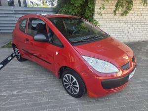 Red Mitsubishi Colt 2008 in Vilnius, with an engine capacity of 1.12 L and mileage of 125 thousand km for 1300 €, photo 4 on AUTOMOTO.COM.LV