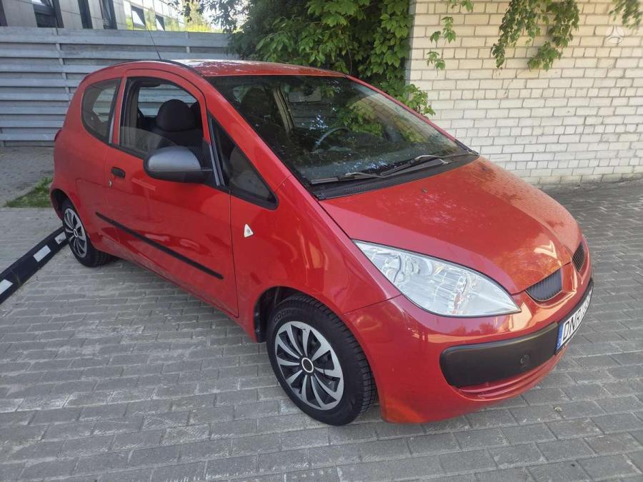 Red Mitsubishi Colt 2008 in Vilnius, with an engine capacity of 1.12 L and mileage of 125 thousand km for 1300 €, photo 4 on AUTOMOTO.COM.LV