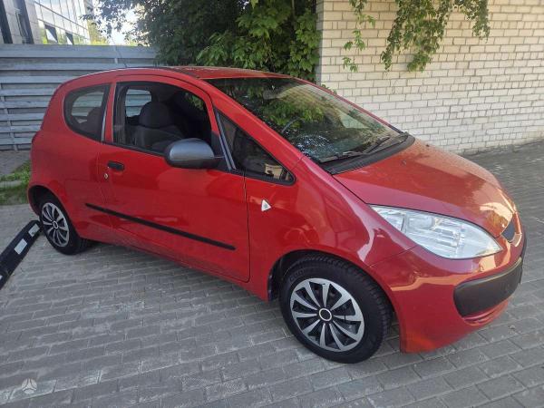 Red Mitsubishi Colt 2008 in Vilnius, with an engine capacity of 1.12 L and mileage of 125 thousand km for 1300 €, photo 4 on AUTOMOTO.COM.LV
