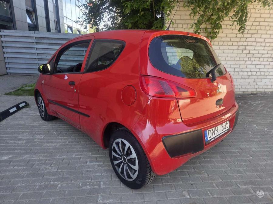Red Mitsubishi Colt 2008 in Vilnius, with an engine capacity of 1.12 L and mileage of 125 thousand km for 1300 €, photo 6 on AUTOMOTO.COM.LV