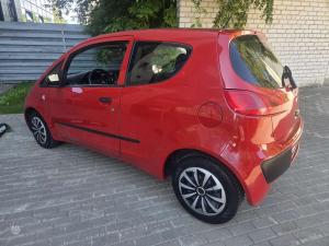 Red Mitsubishi Colt 2008 in Vilnius, with an engine capacity of 1.12 L and mileage of 125 thousand km for 1300 €, photo 7 on AUTOMOTO.COM.LV