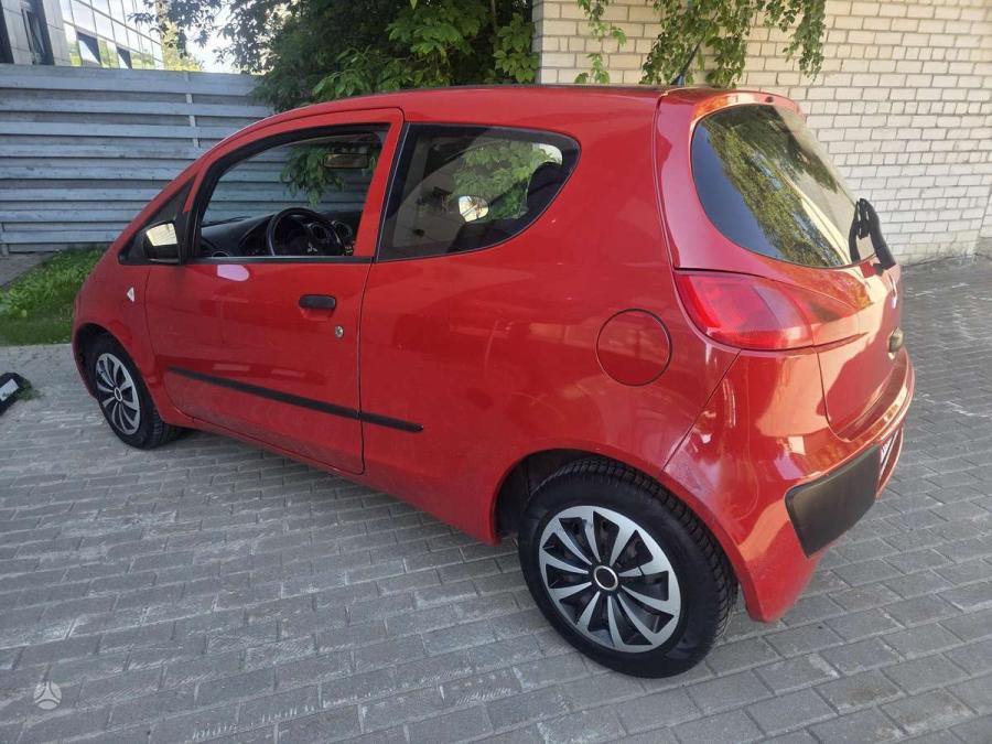 Red Mitsubishi Colt 2008 in Vilnius, with an engine capacity of 1.12 L and mileage of 125 thousand km for 1300 €, photo 7 on AUTOMOTO.COM.LV